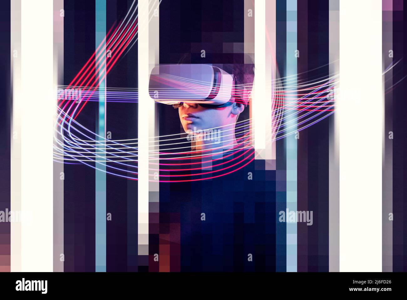 Teenager wearing a VR headset and experiencing virtual reality ...