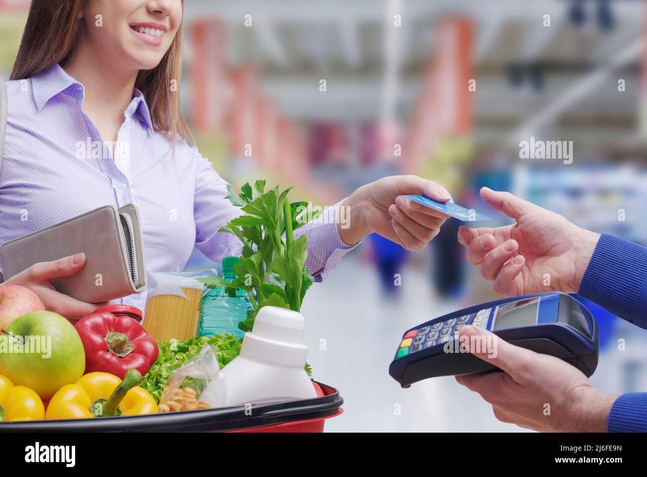 Woman credit card buying goods hi-res stock photography and images - Alamy