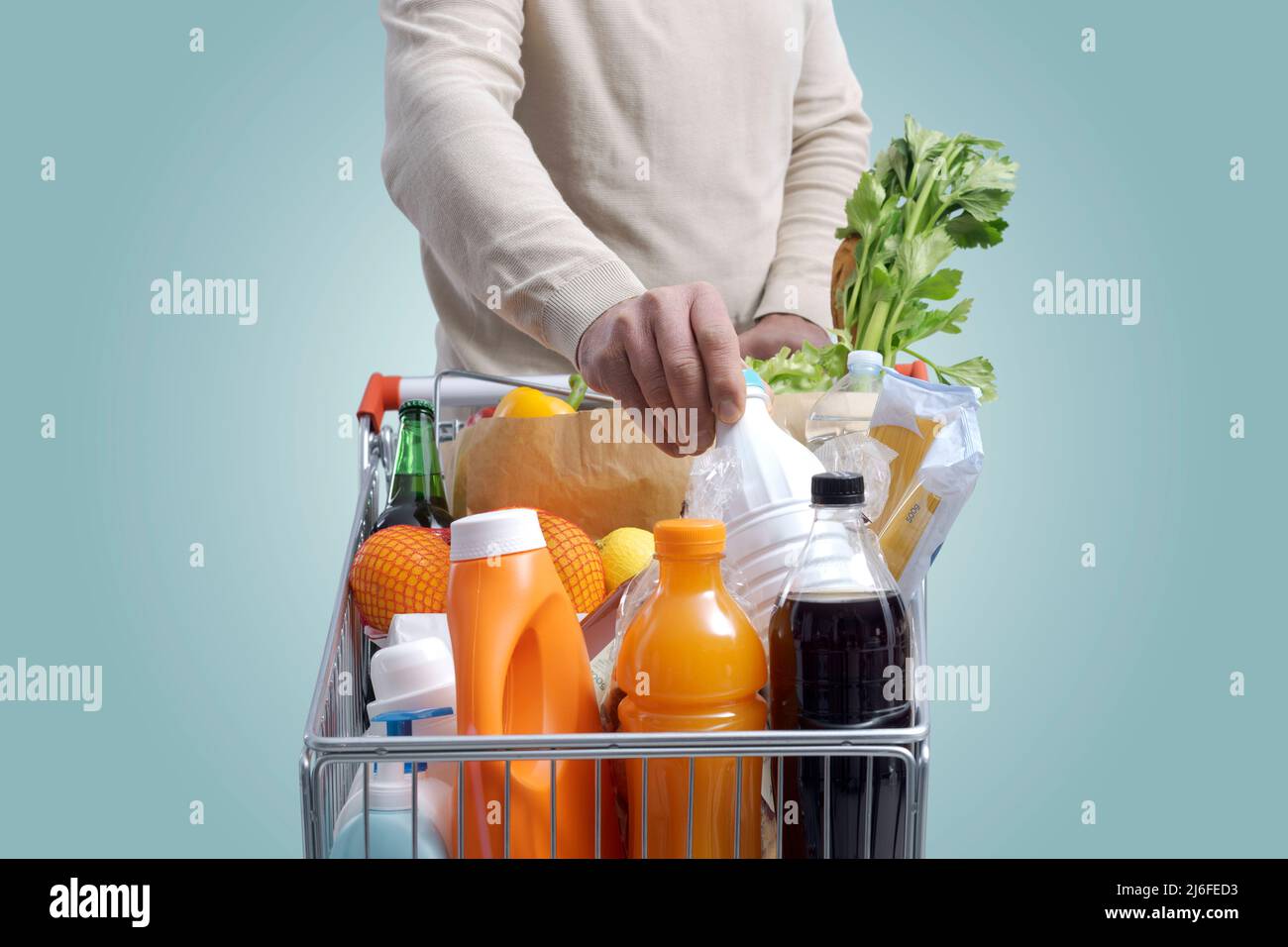 Putting milk in grocery cart hi-res stock photography and images - Alamy