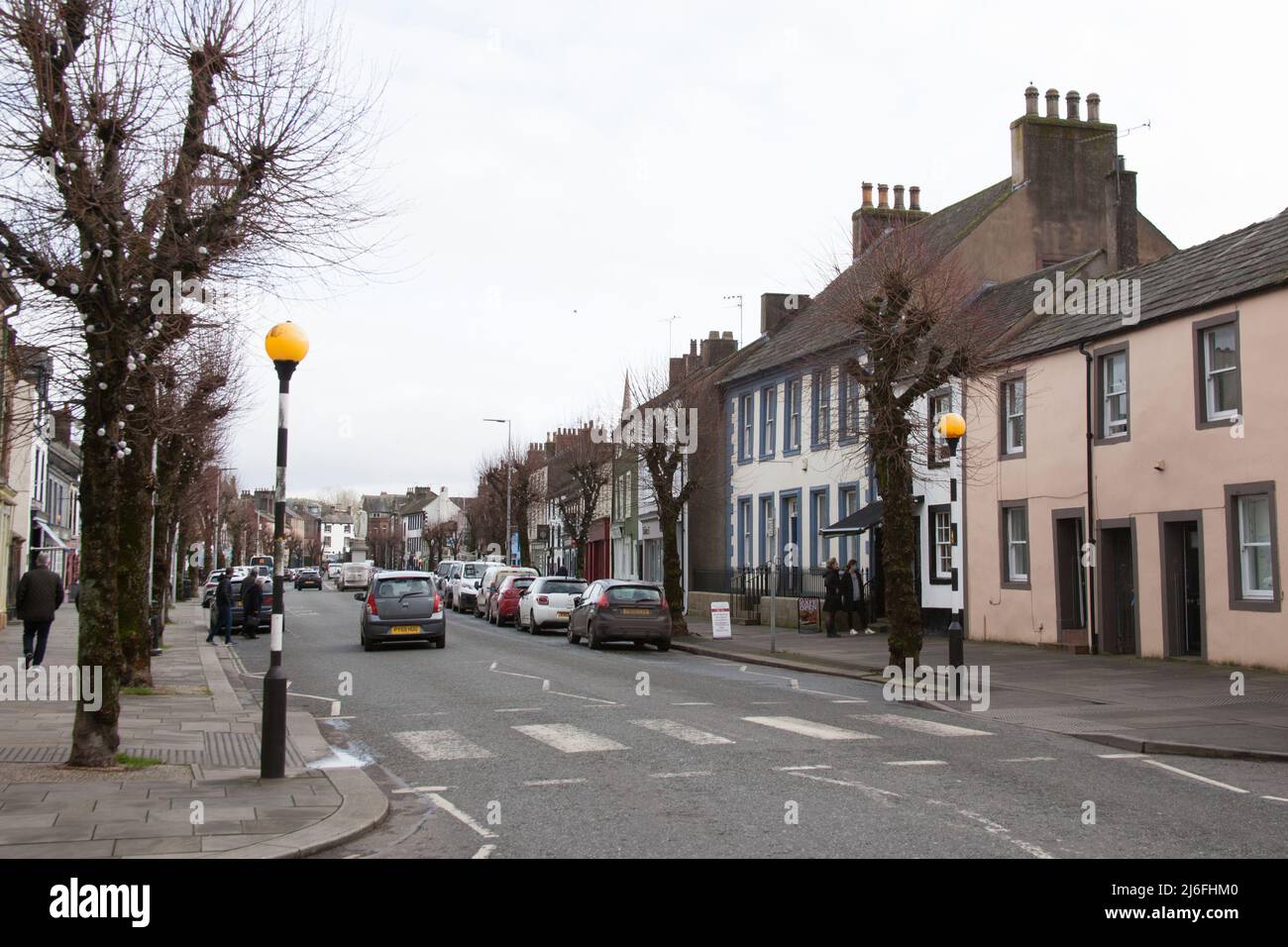 Views along Main Street in Cockermouth, Cumbria in the UK Stock Photo ...