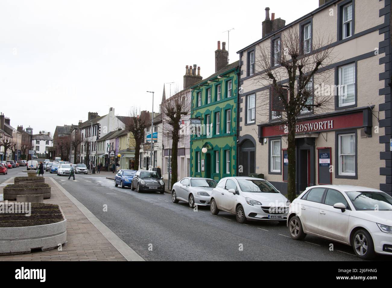 Views along Main Street in Cockermouth, Cumbria in the UK Stock Photo ...