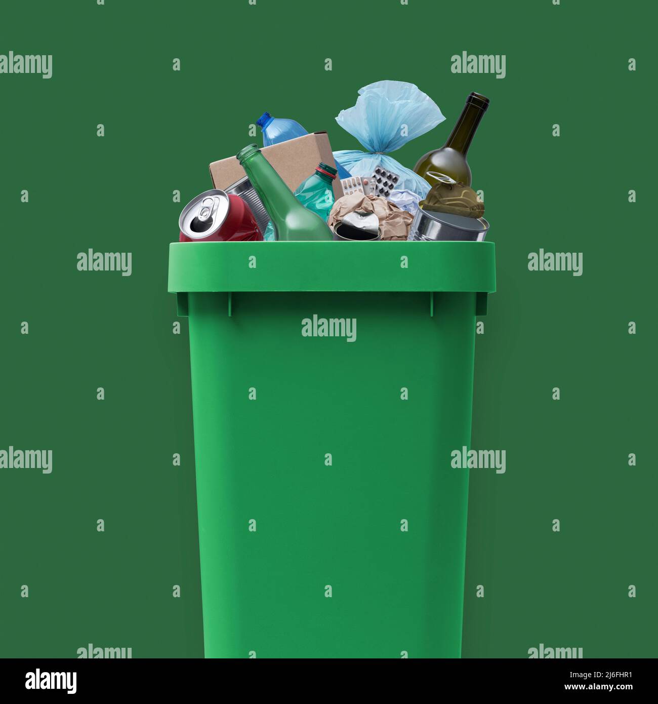 Waste bin full of mixed undifferentiated garbage, improper waste ...