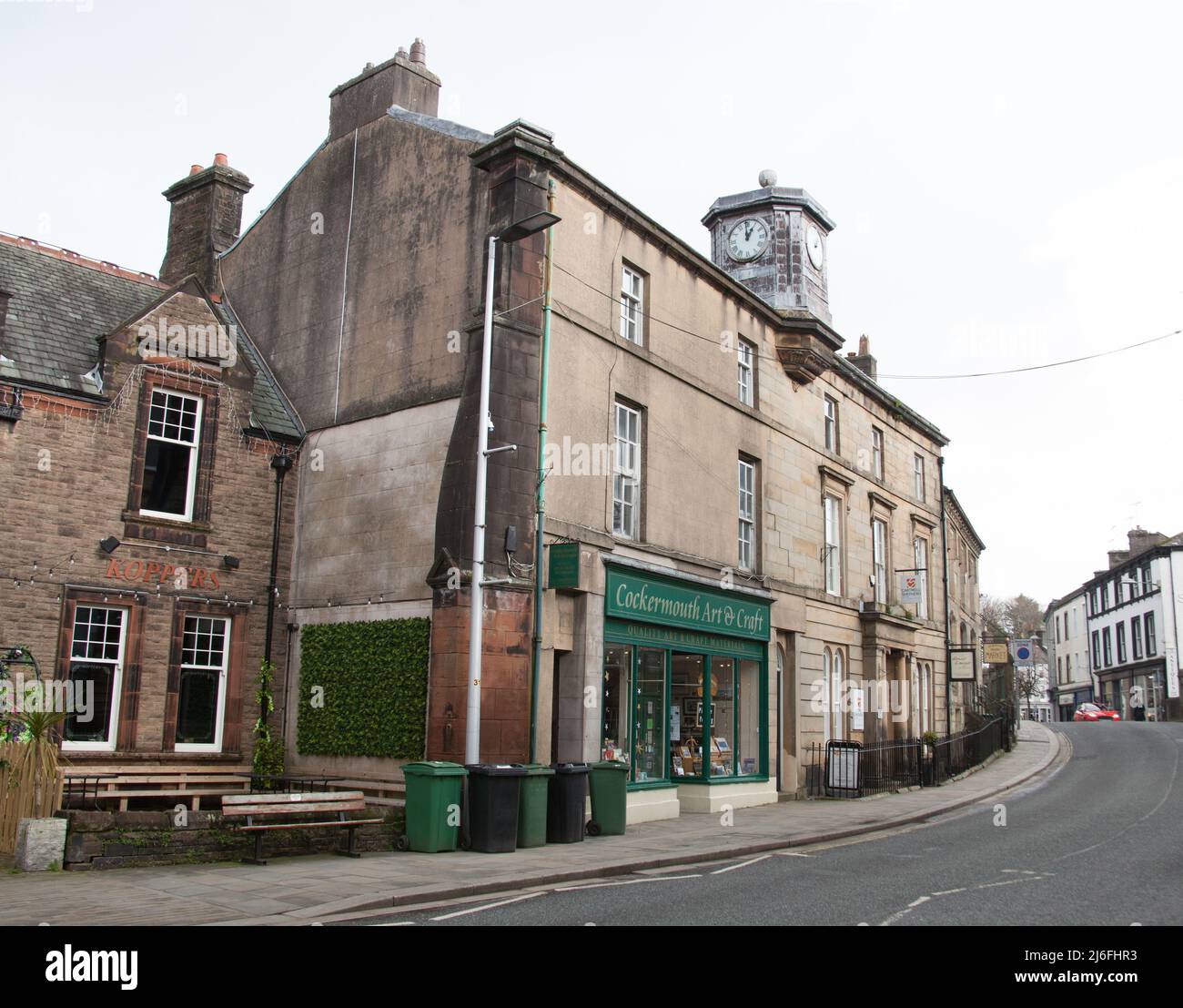 Views along Main Street in Cockermouth, Cumbria in the UK Stock Photo ...