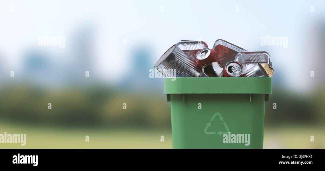 Garbage can full of metal waste, recycling and separate waste ...