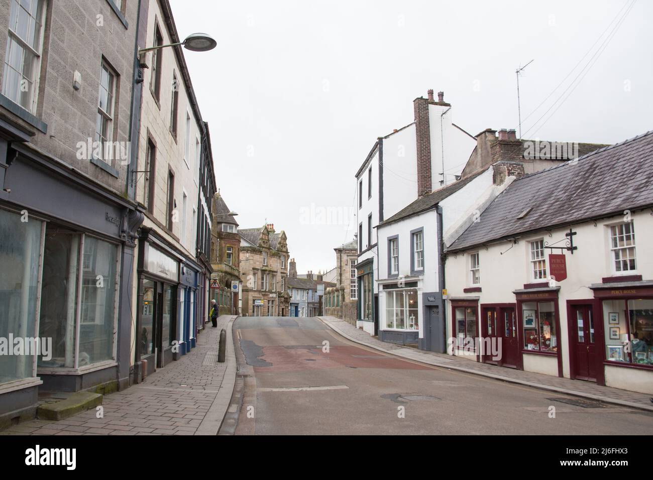 Views along Main Street in Cockermouth, Cumbria in the UK Stock Photo ...