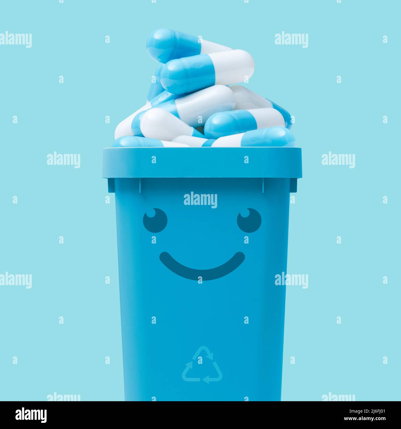 Smiling trash can full of expired pills, medical waste disposal concept ...
