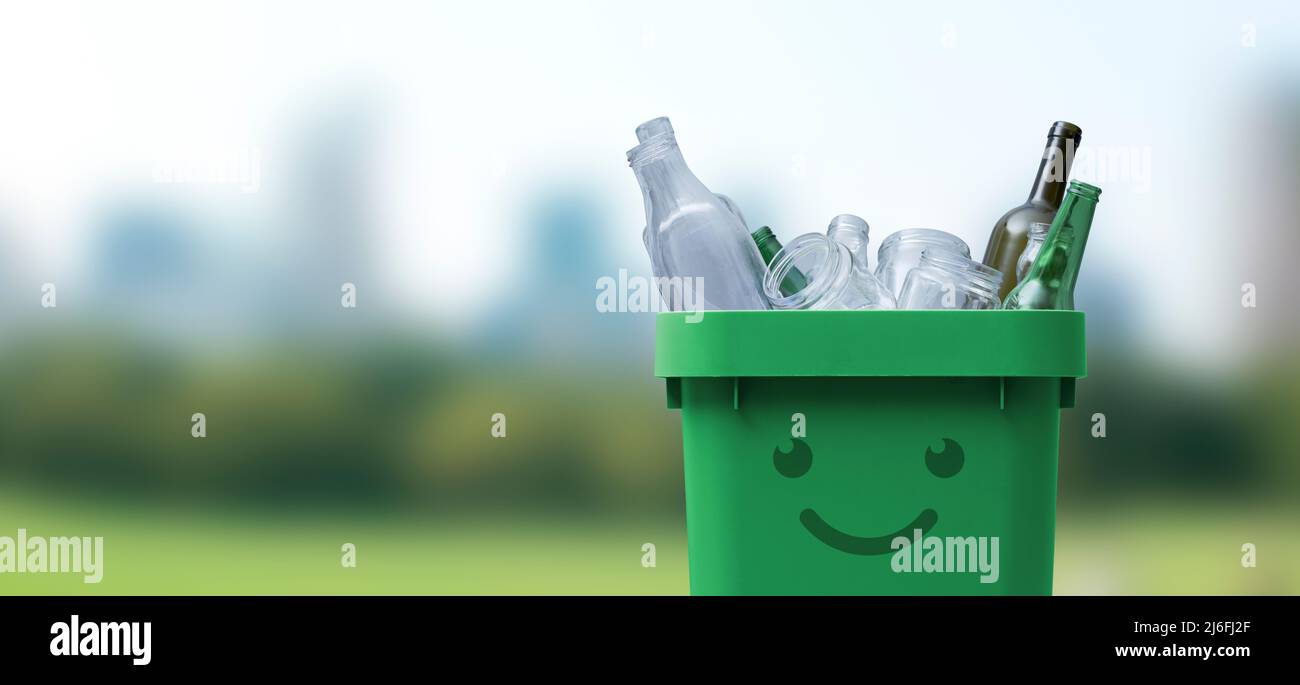 Smiling garbage can full of glass waste, recycling and separate waste ...