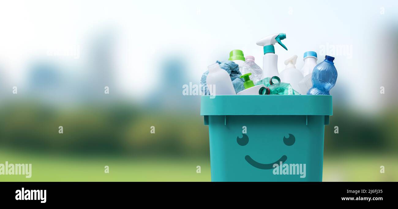 Cute smiling bin full of mixed plastic waste, recycling and separate ...