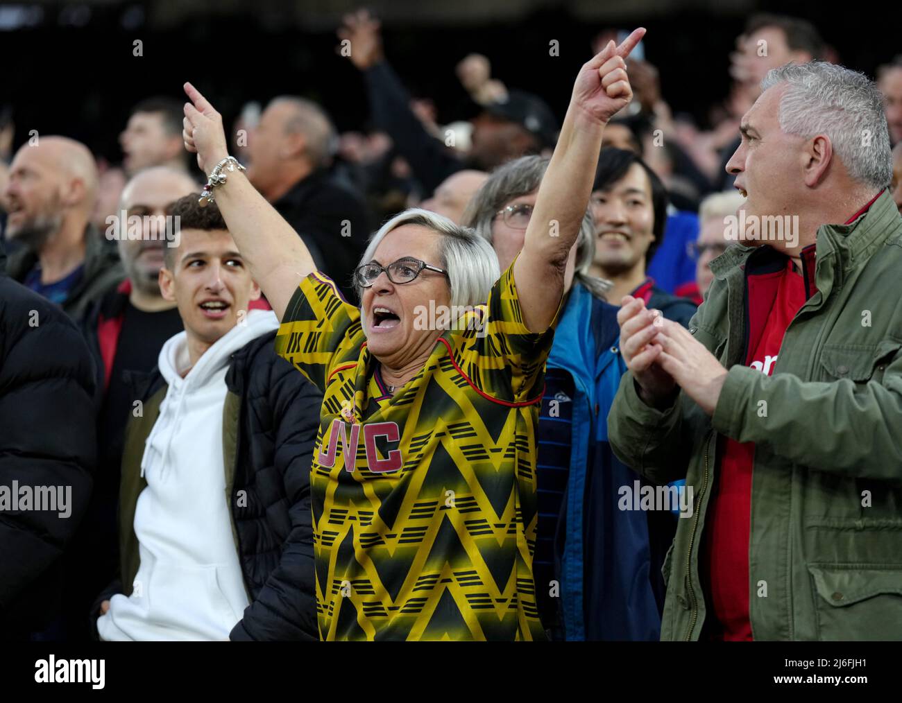 Arsenal fans celebrate at full time after the Premier League match at ...