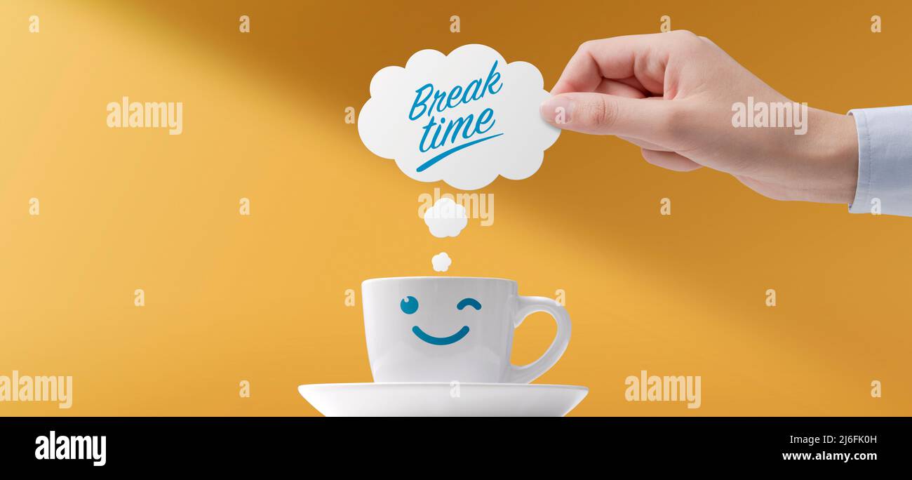 It's coffee break time with cute smiling character cup Stock Photo - Alamy