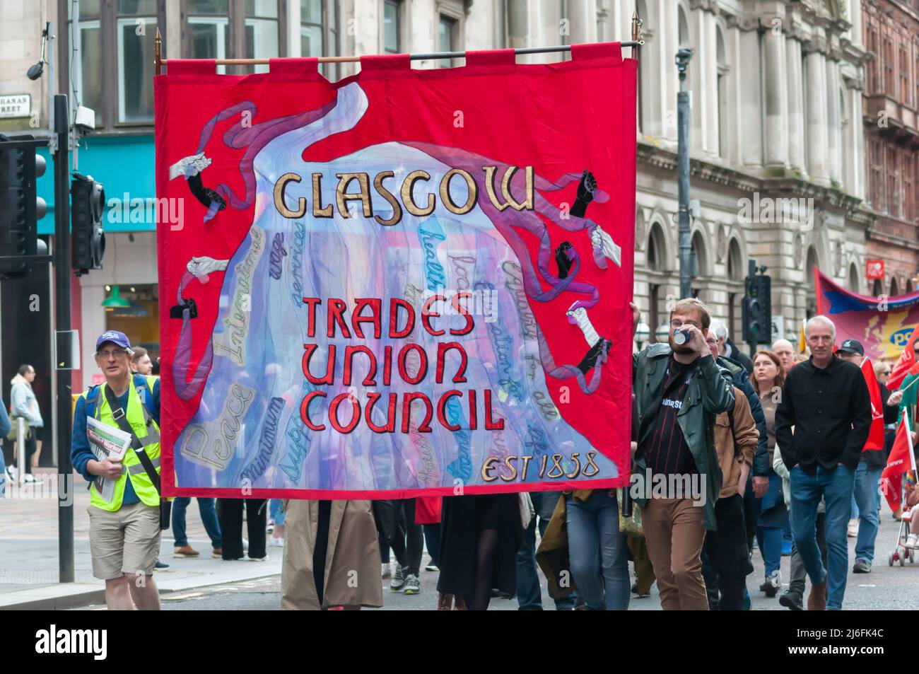 Glasgow, Scotland, UK. 1st May, 2022. Campaigners march through the ...