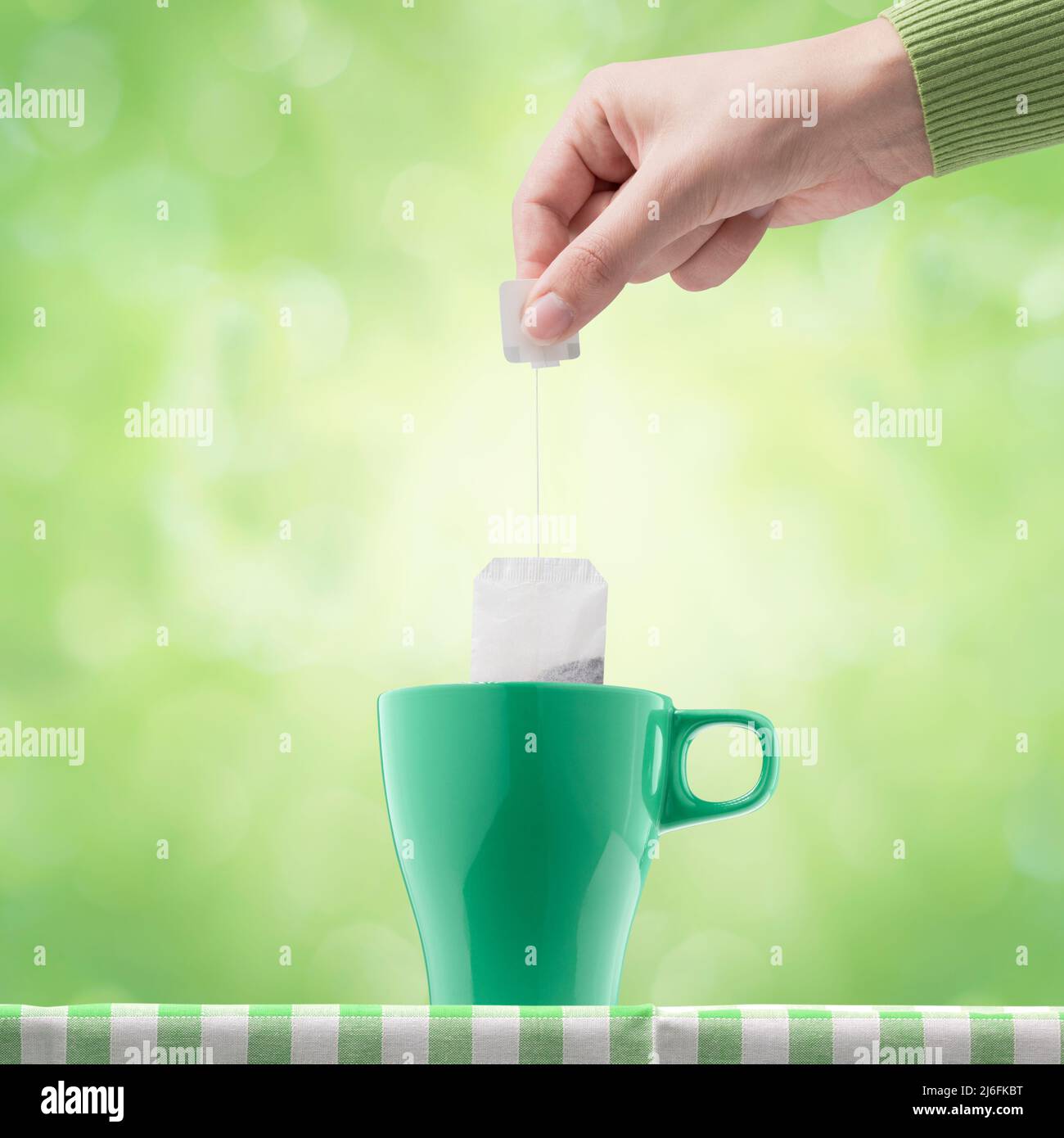 Woman herbal tea summer garden hi-res stock photography and images - Alamy