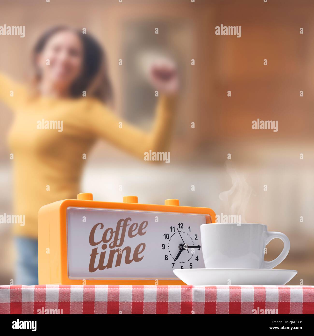 Happy young woman having a coffee break, clock and coffee cup in the ...