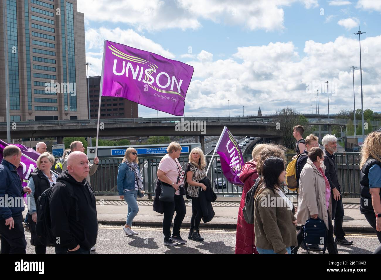 Glasgow, Scotland, UK. 1st May, 2022. Campaigners march through the ...