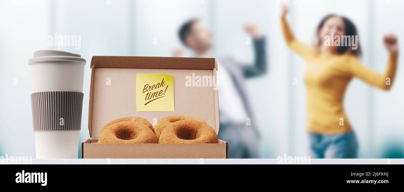 Happy business people taking a break during work hours, coffee and ...