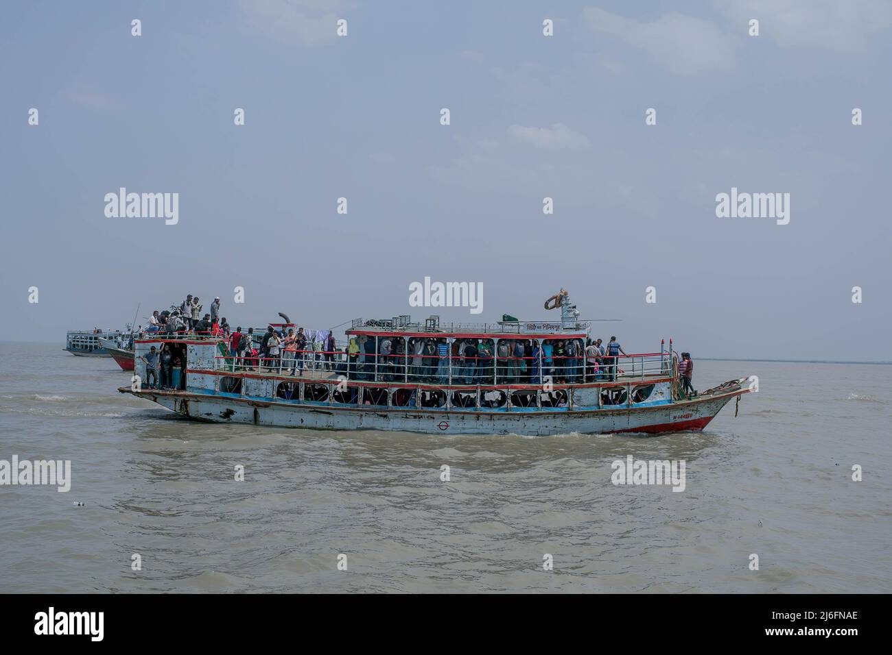 Bangladeshi people are seen on a ferry travelling to their native places ahead of the Eid al ...