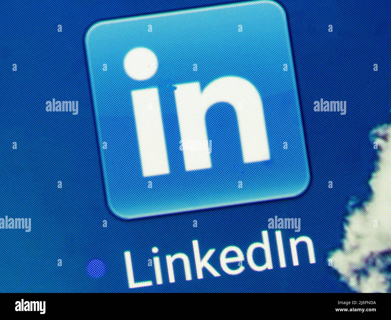 In this photo illustration, the Linkedin logo is displayed on a ...