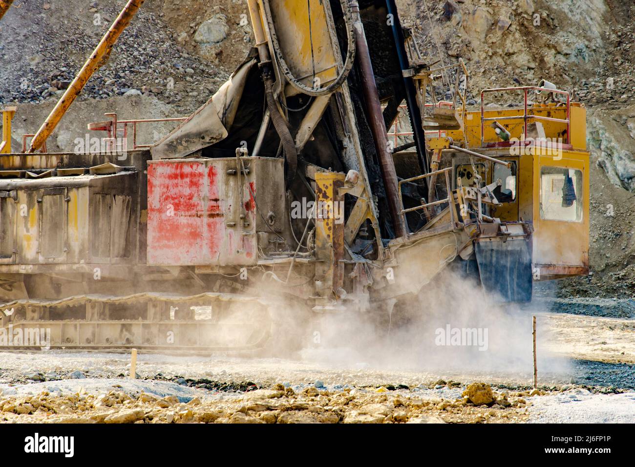 View at drilling rig in open pit mine Stock Photo - Alamy