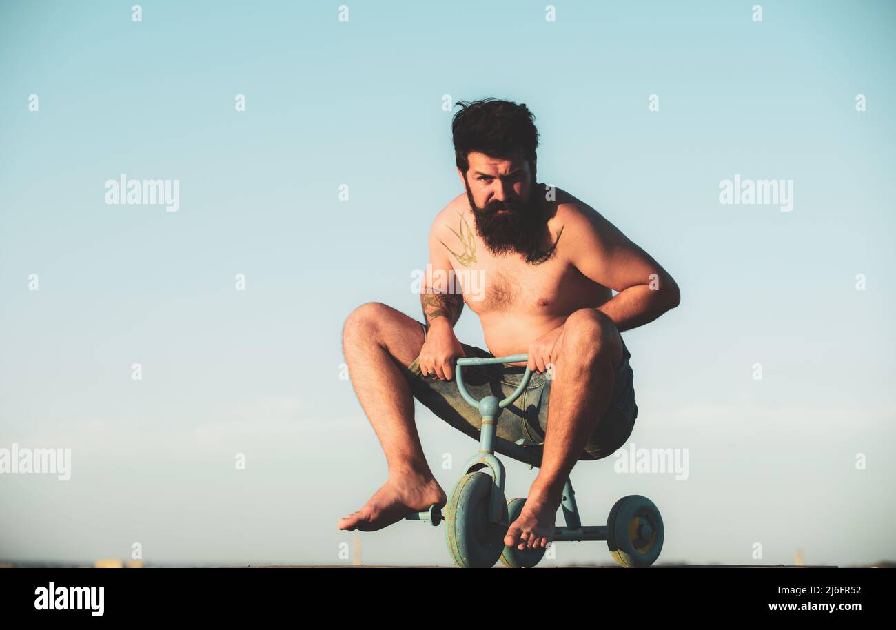 Crazy young man riding a small bike hi-res stock photography and images ...