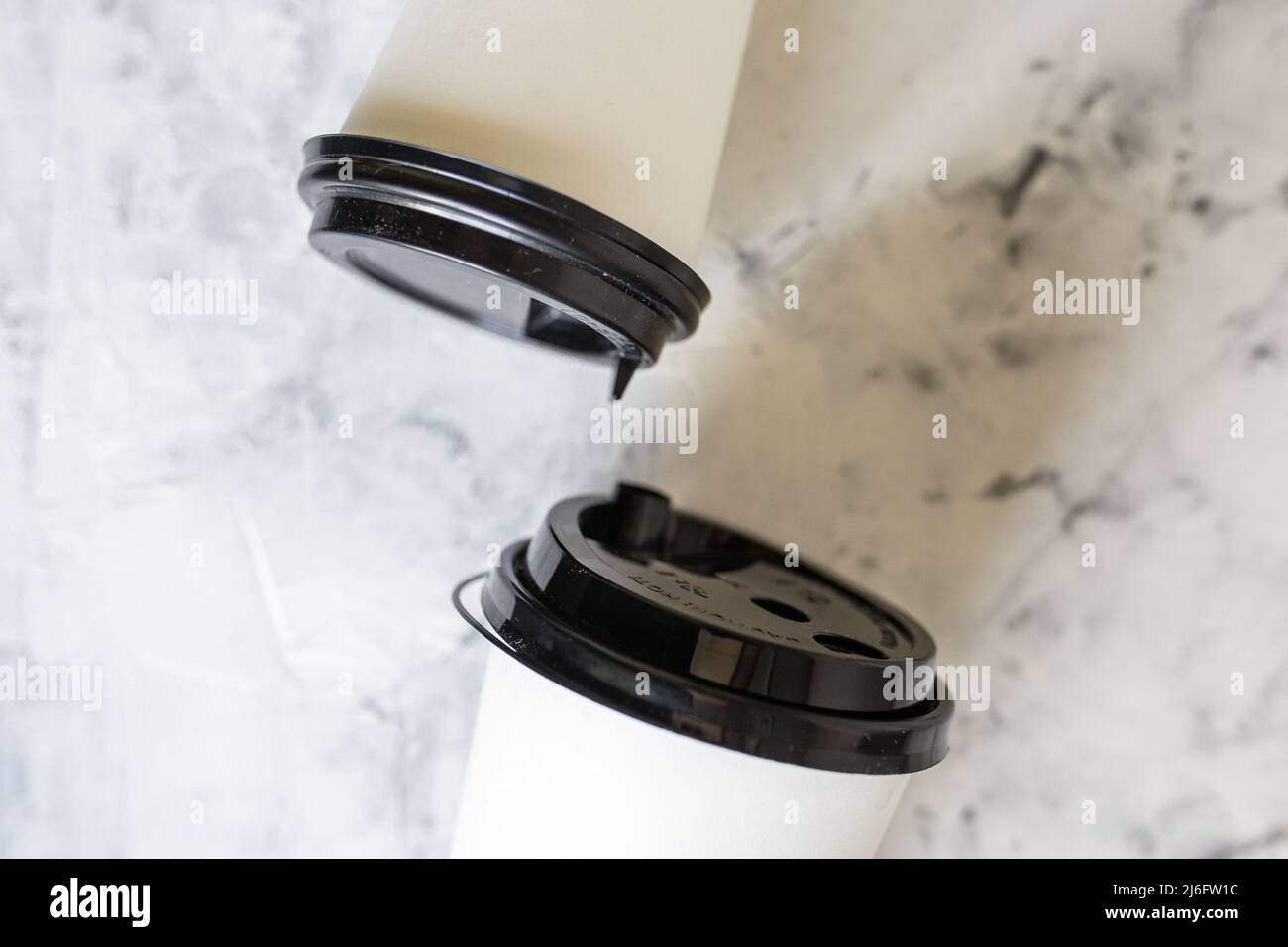 white cardboard coffee cups top view. disposable tableware Stock Photo ...