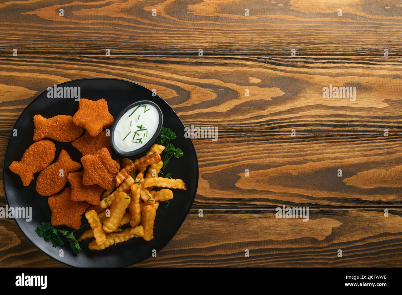 Fish and Chips british fast food. Fish Sticks with french fries set on ...