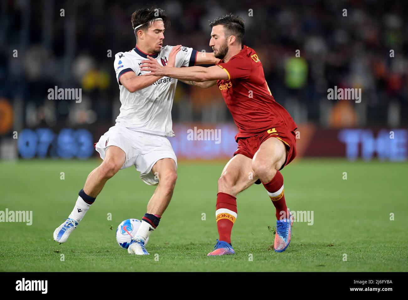 Denso Kasius of Bologna FC and Bryan Cristante of AS Roma during the ...