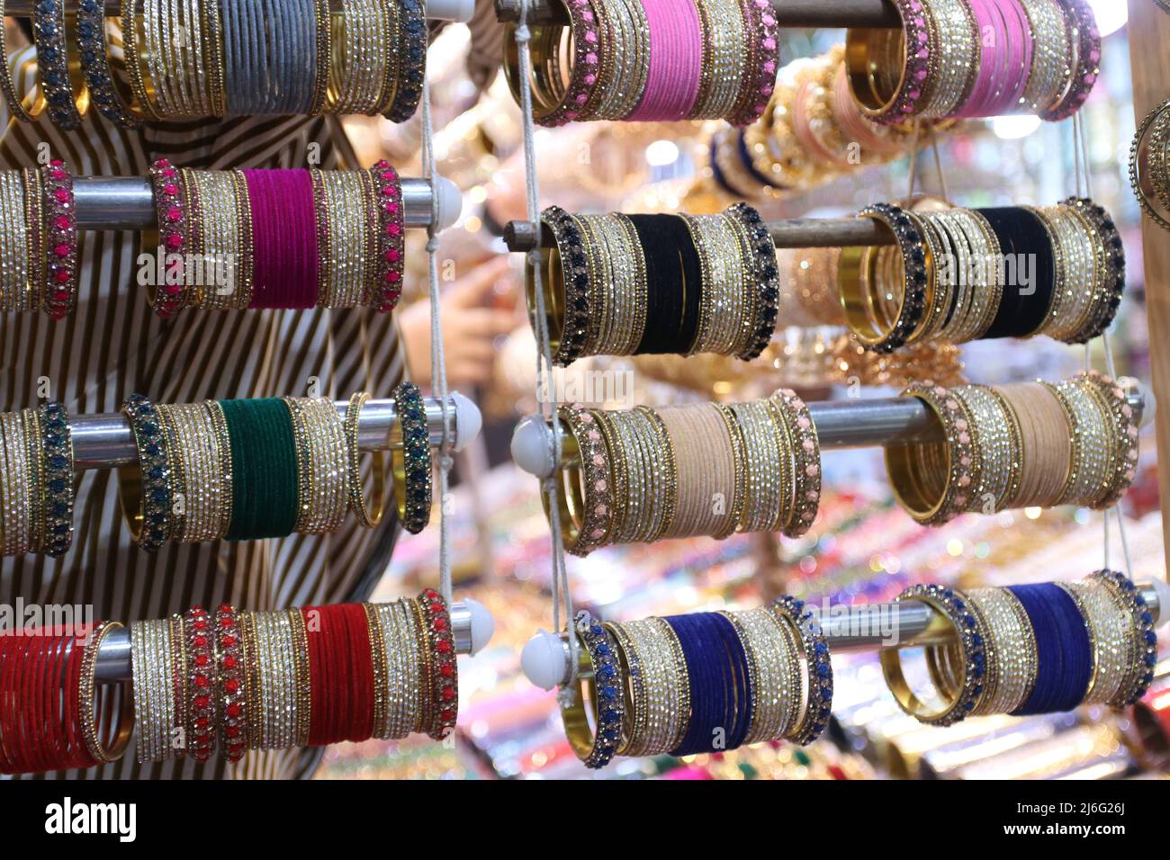 Muslim women busy marketing color bangles hi-res stock photography and ...