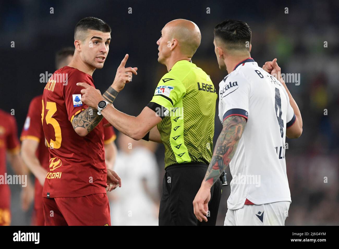 Gianluca Mancini of AS Roma and Kevin Bonifazi of Bologna FC during the ...