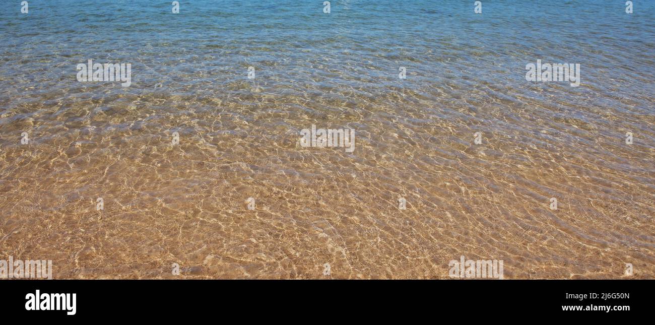 Sea background, nature of tropical summer beach with rays of sun light ...