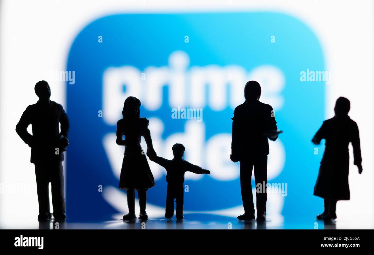In this photo illustration, miniature figures standing in front of a ...