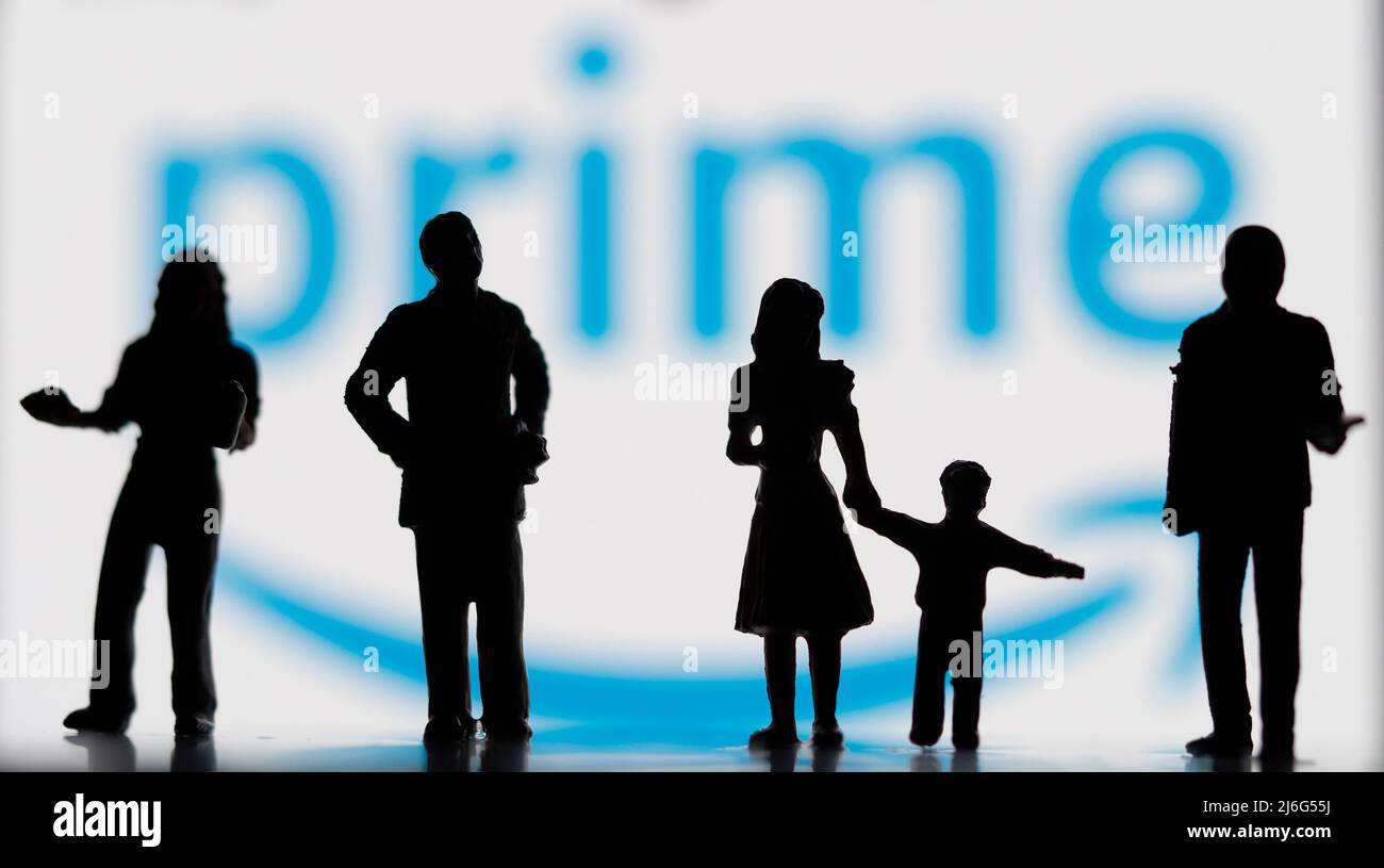 In this photo illustration, miniature figures standing in front of a ...