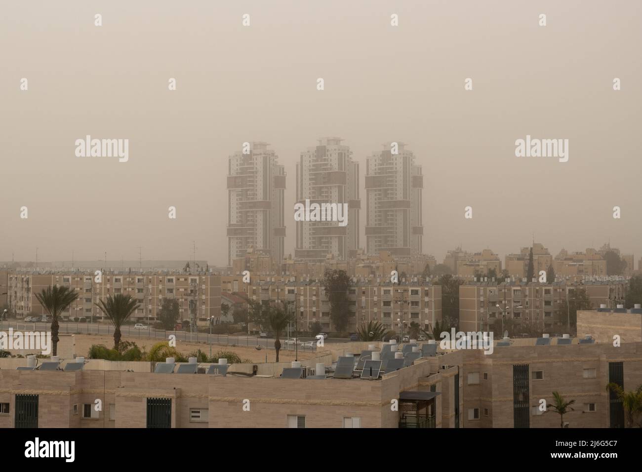 Contrast Architecture in south of Israel during sandstorm in the city ...