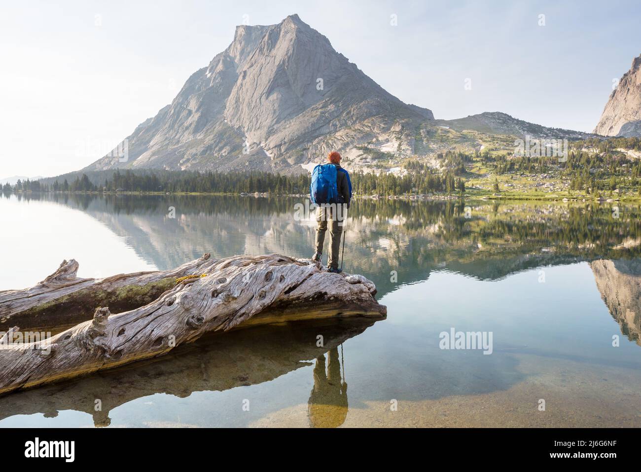 Backpacker in hike in the high mountains Stock Photo - Alamy