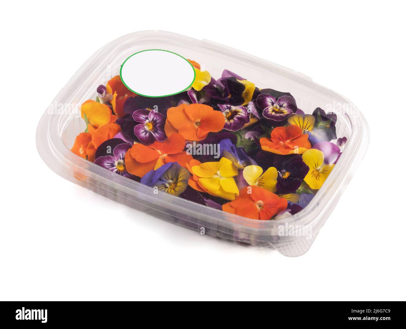 Edible flowers of all colours for the presentation of dishes on a white ...