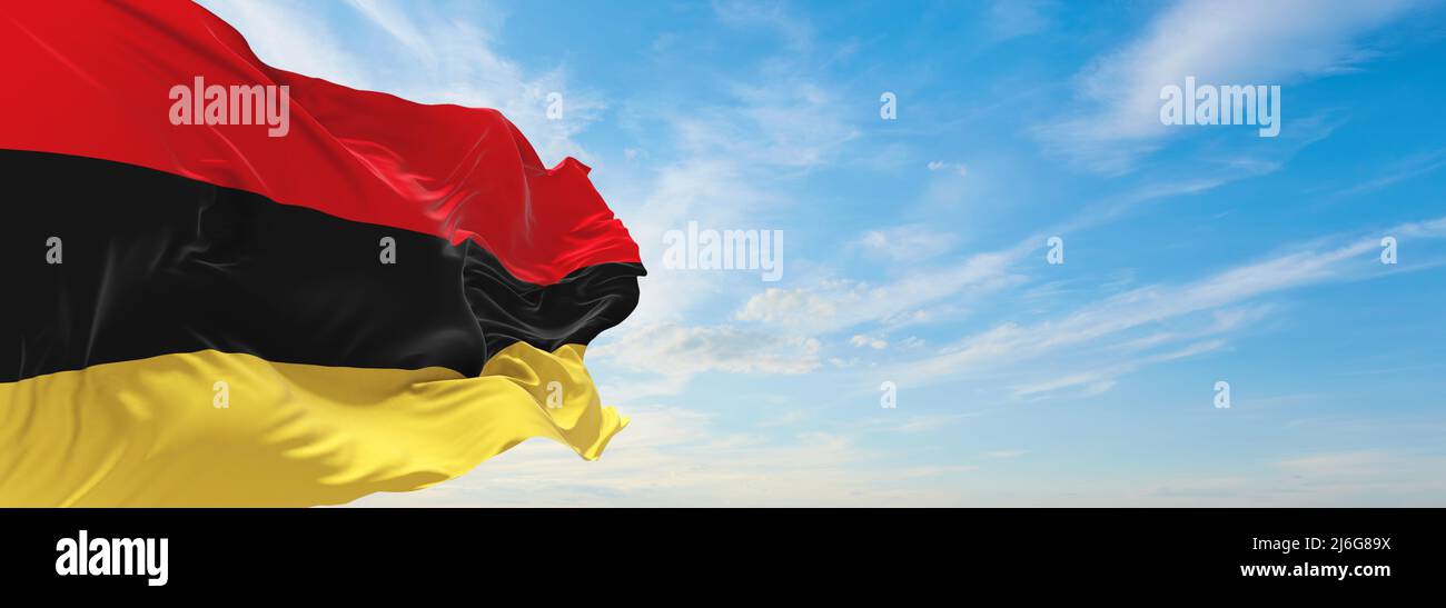 official flag of Brabantine Revolution, Belgium at cloudy sky ...