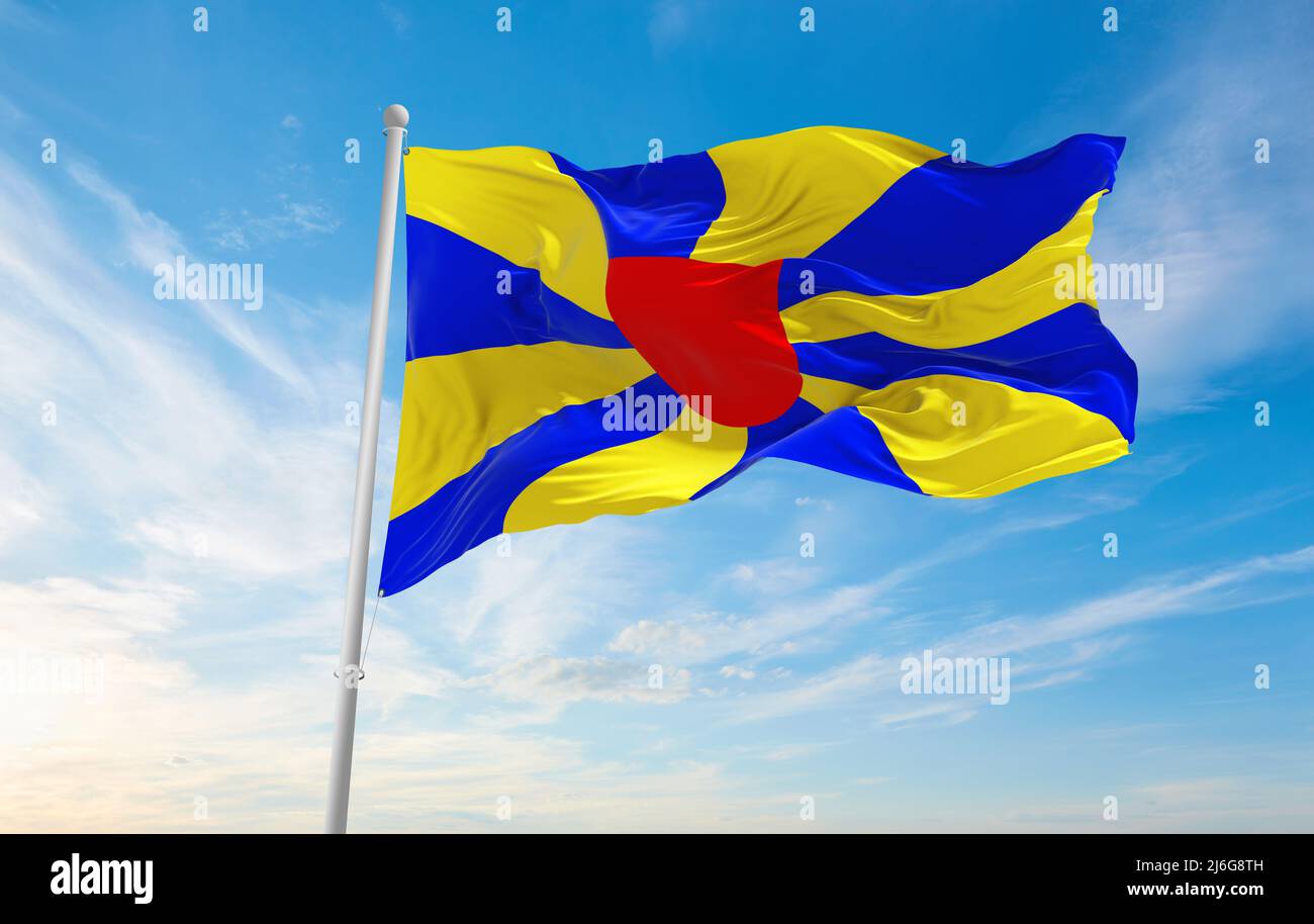 official flag of West Flanders, Belgium at cloudy sky background on ...