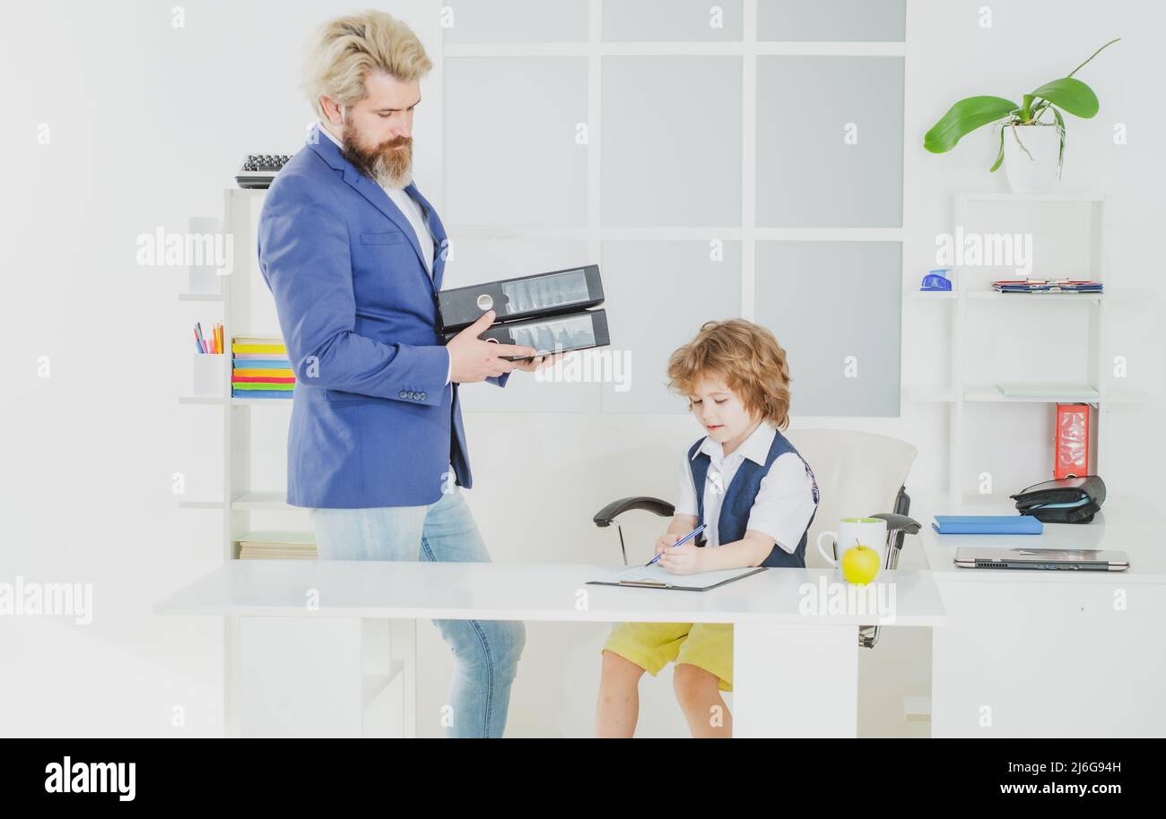 Business partners little child businessman and his older mentor. Father ...