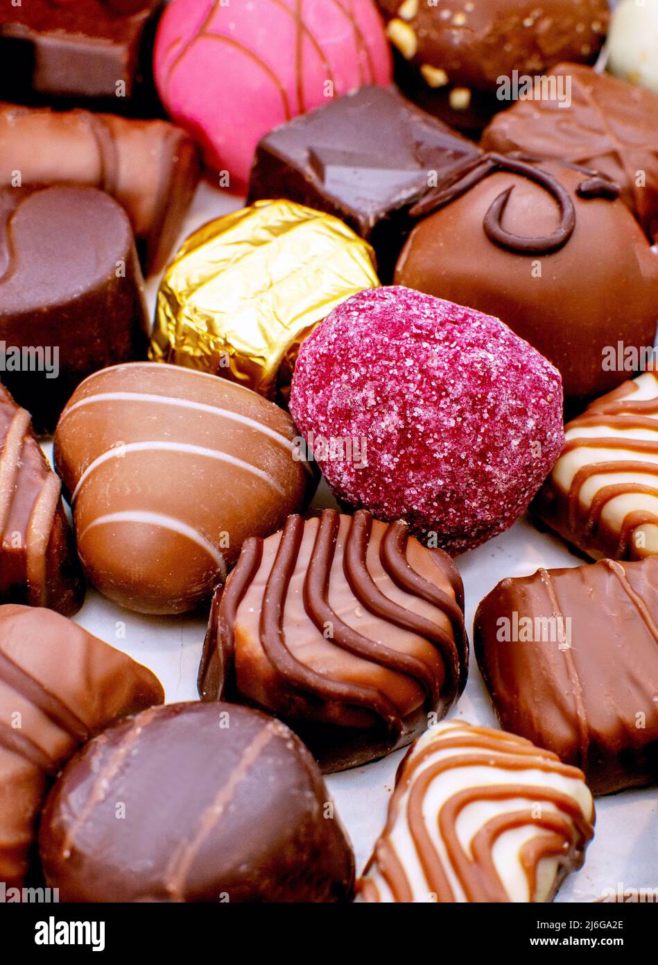 sweet still life of chocolates in many shapes and varieties Stock Photo ...
