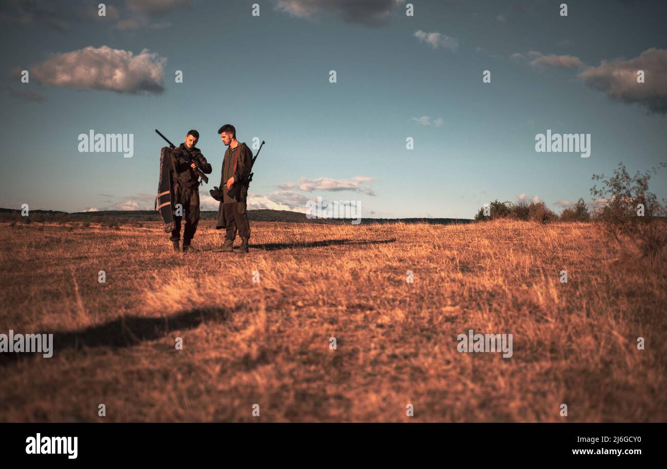 HunterS with shotgun gun on hunt. Calibers of hunting rifles. HunterS ...