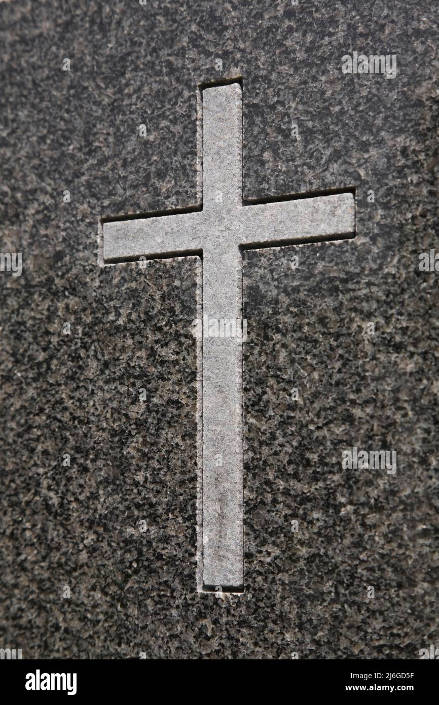 Religious cross on a memorial monument in cemetery Stock Photo - Alamy