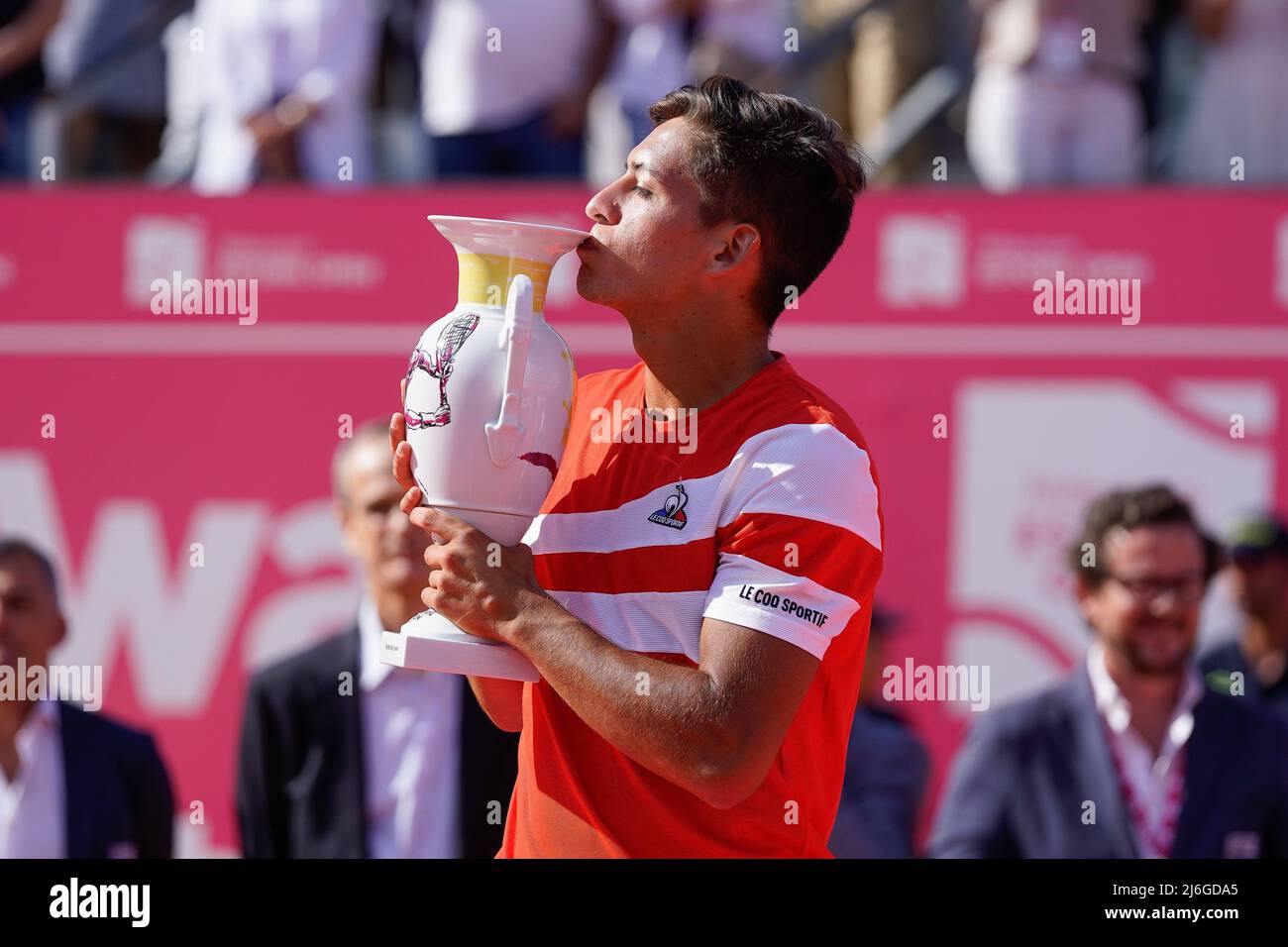 Sebastian Baez from Argentina poses with his trophy after winning the ...