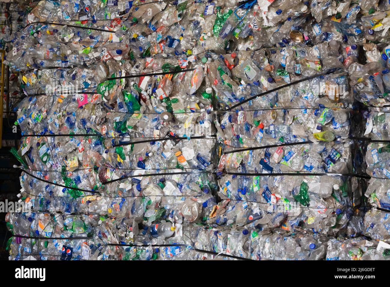 Bales of recyclable plastic bottles at sorting centre Stock Photo - Alamy