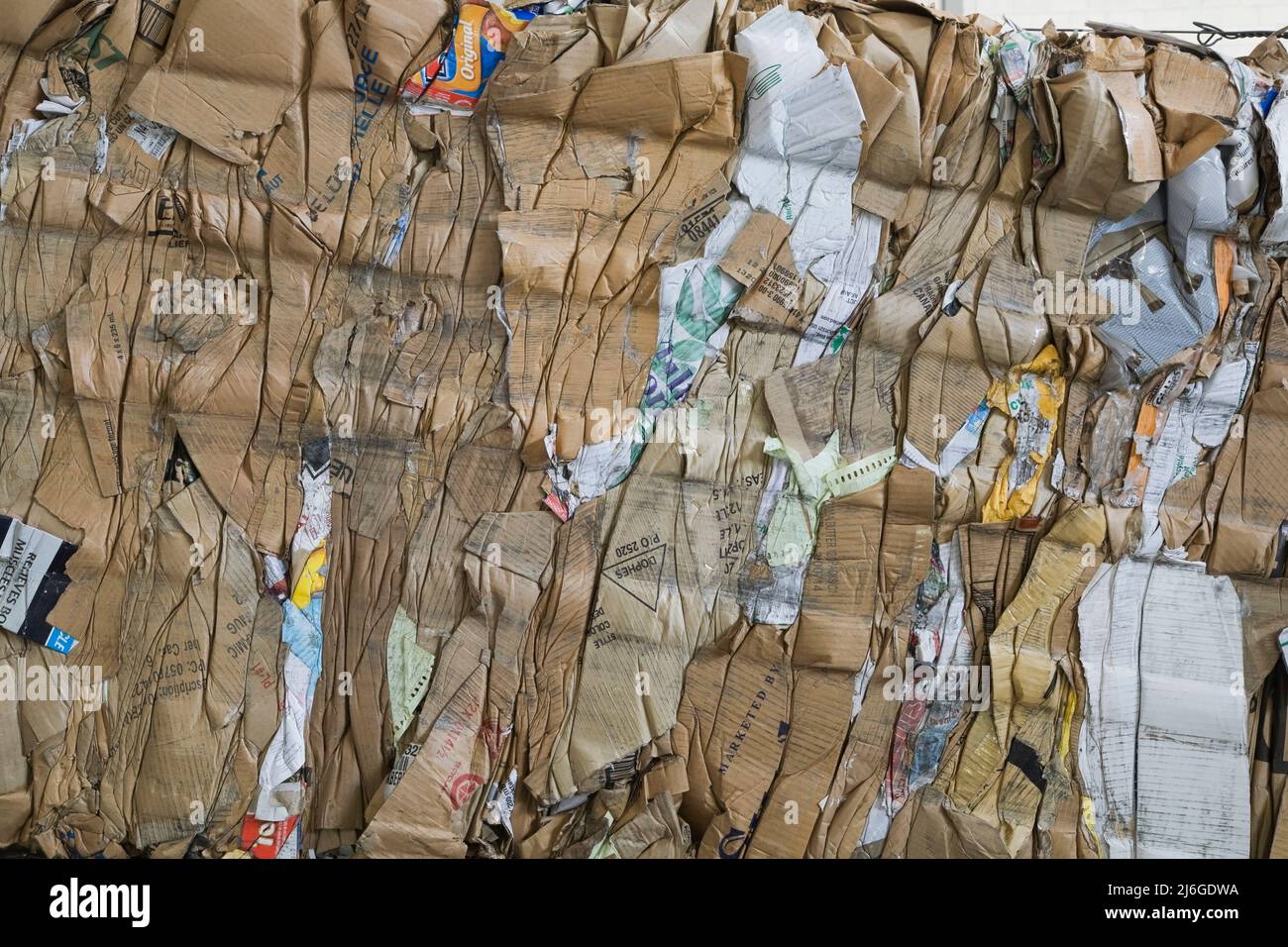 Bale of recyclable cardboard at sorting centre Stock Photo - Alamy