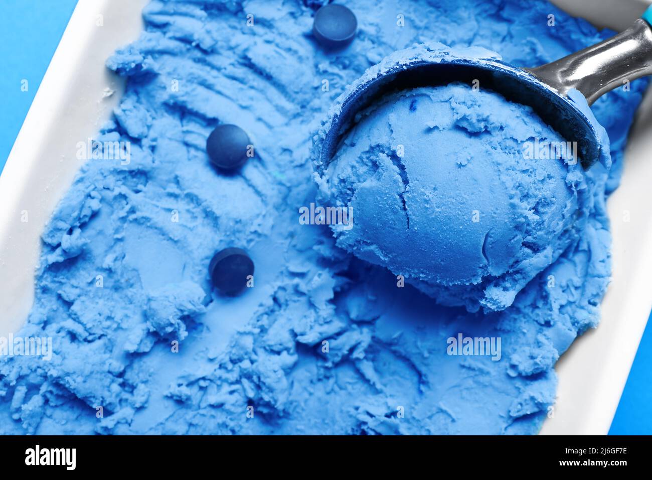 Scoop in bowl with tasty blue spirulina ice cream and pills closeup Stock Photo Alamy