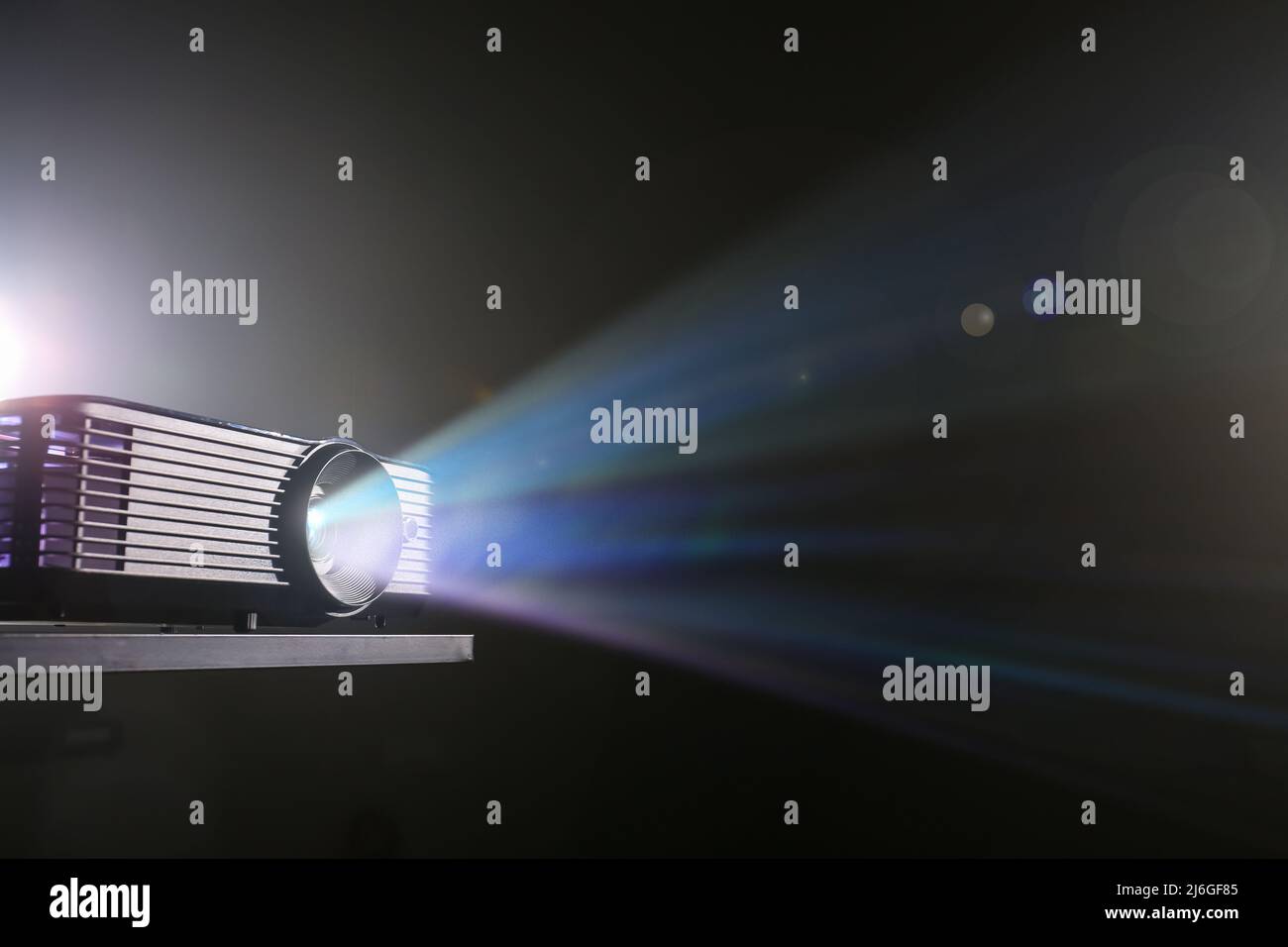 Modern video projector on black background Stock Photo - Alamy