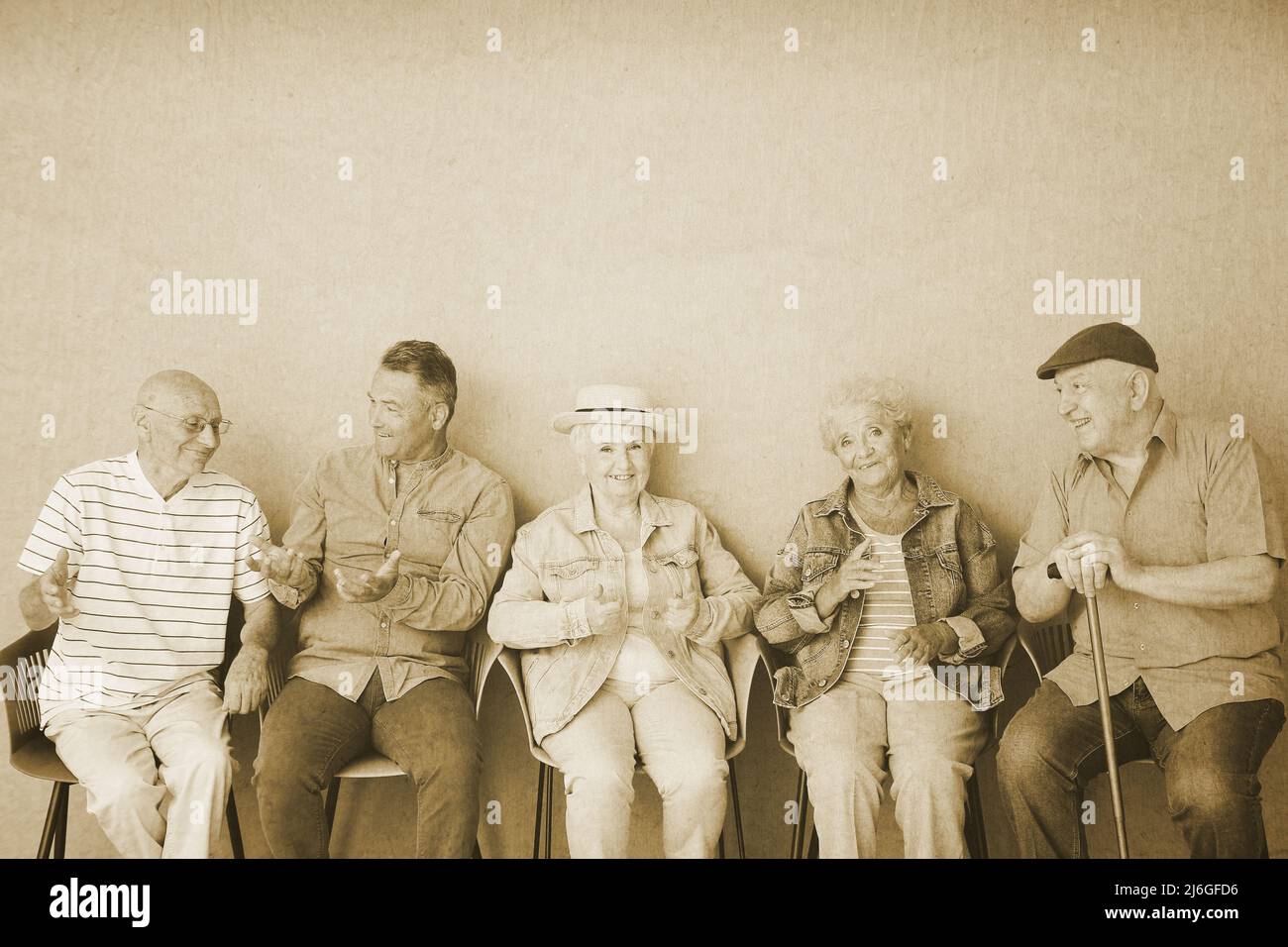 Old photo of senior people sitting on chairs Stock Photo - Alamy