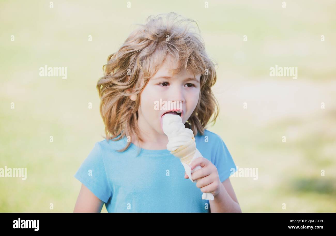 Funny child eating icecream, face close up. Kids head portrait Stock ...