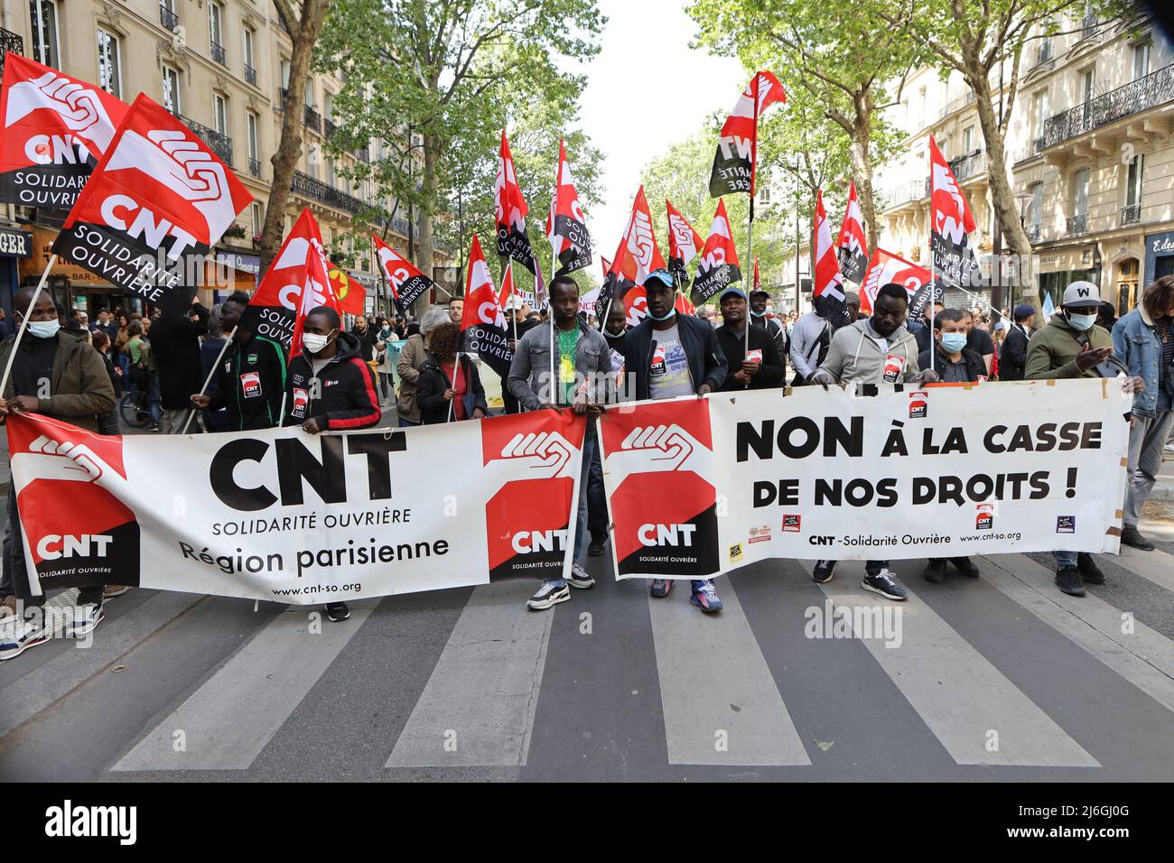 Confederación Nacional del Trabajo (CNT) union demonstrators march with ...