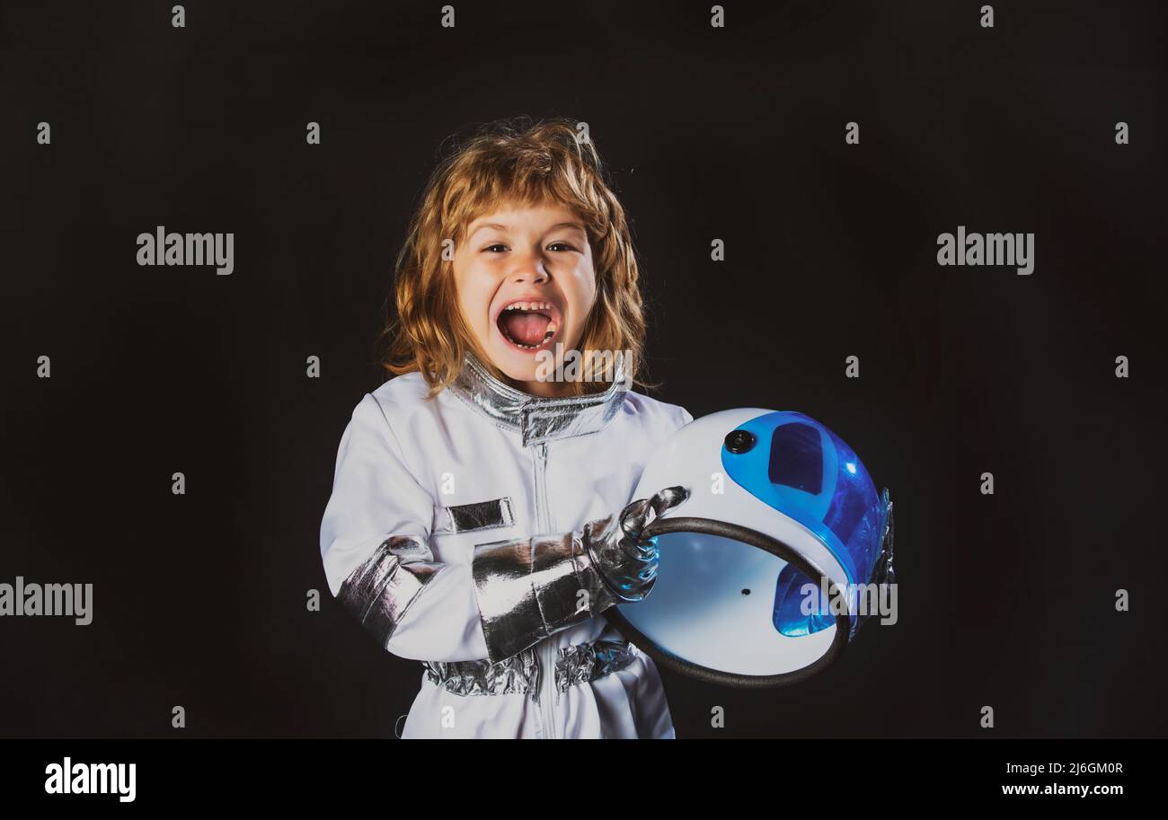 Space kids cosmonaut concept. Portrait of positive excited little boy ...