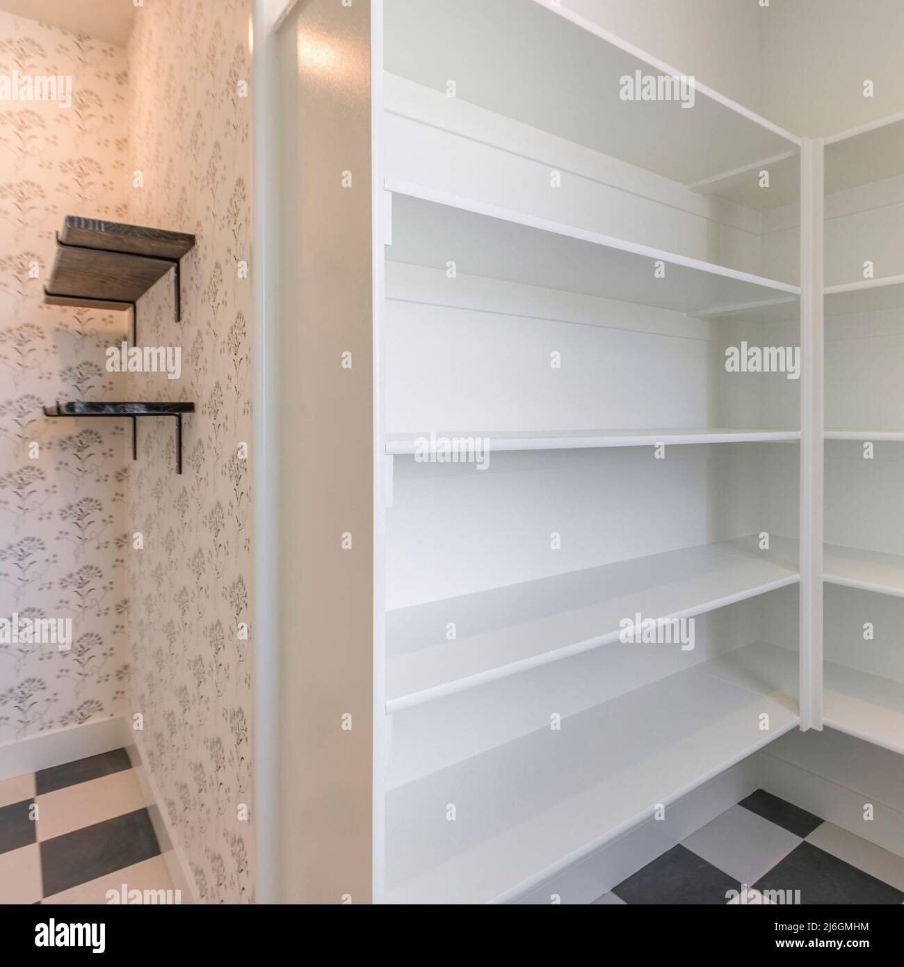 Square Kitchen pantry interior with built in shelves cabinet Stock ...